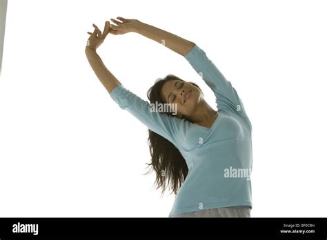 Stretching Arms Over Head