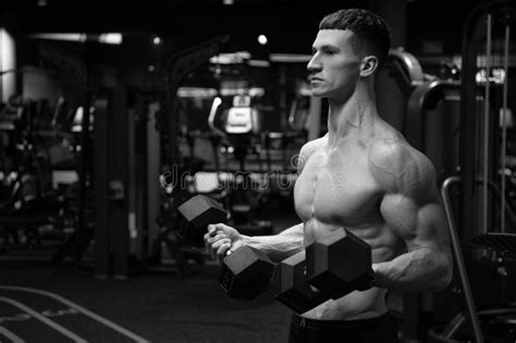 Shirtless Man Doing Bicep Curls With Dumbbells In Gym Biceps Workout Stock Image Image Of