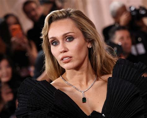 Miley Cyrus Stuns In A Daring One Shoulder Lbd With A Hip High Leg Slit