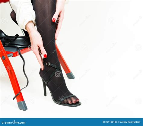 Feet In Black Shiny Pantyhose And High Heels Stock Image Image Of