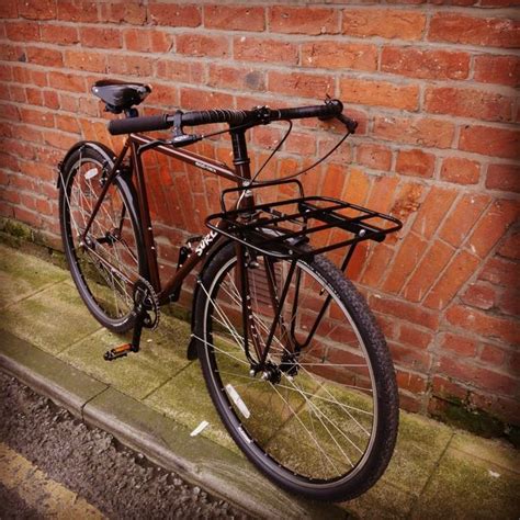 Cycling Clothing And Equipment Bicycle Against Brick Wall