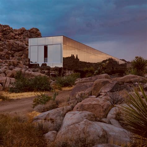 mirror clad invisible house reflects its desert surrounds