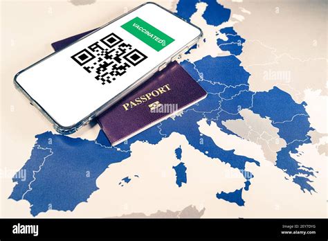 Digital Green Passport With Qr Code On A Smartphone Over An Eu Map