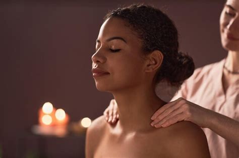 Premium Photo Woman Enjoying Shoulders Massage