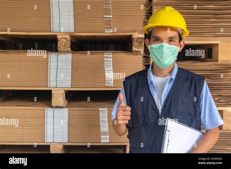 Worker Checking Raw Material Inventory In Factory Stock Photo Alamy