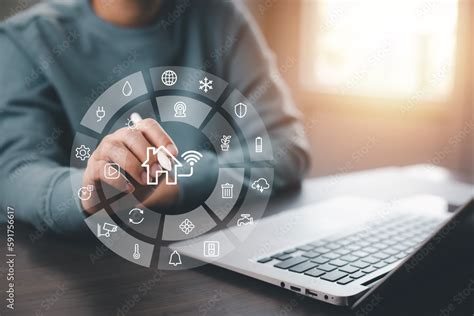 Hand Using Ai Smart Tablet With Smart Home App On The Room Circular Interface Of The Smart Home