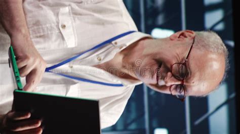 Vertical Computer Scientist Optimizes Data Center Stock Footage Video Of Technology Optimal