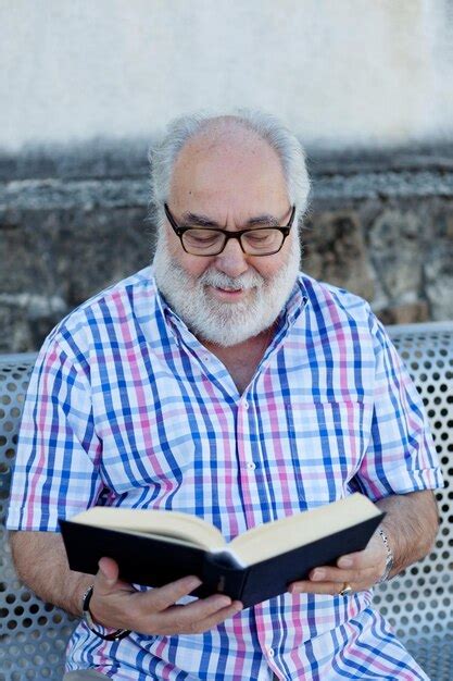 Premium Photo Portrait Of Man Holding Mobile Phone