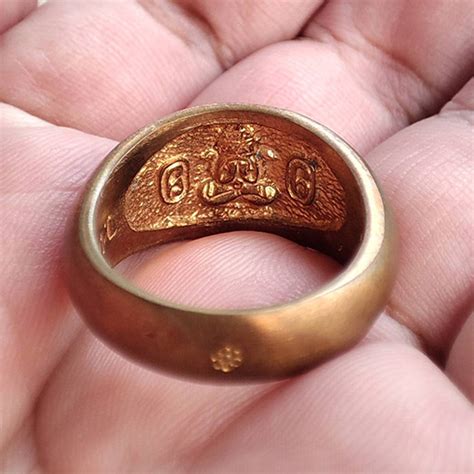 เขาอ้อ มงคลจักรวาลพุทธาคมเขาอ้อปี 45 แหวนปลอกมีด เนื้อนวะโลหะแก่ทองคำ ท่านขุนพันธ์ฯเป็นเจ้า