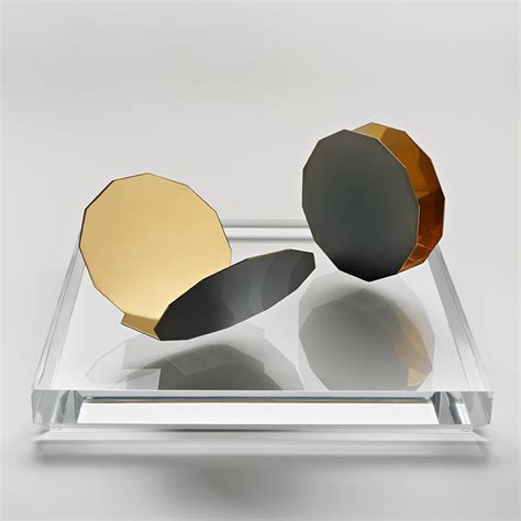 Hexagonal Metal Objects On Glass Plate