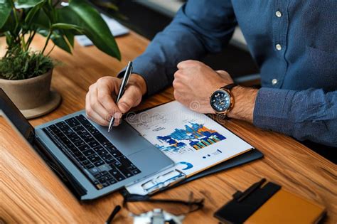 Business Professionals Analyzing Market Trends In A Modern Workspace Stock Image Image Of