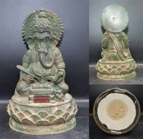 พระพิฆเนศปางทรงอักษร ขนาดบูชา รุ่นพรสวรรค์ เนื้อสัมฤทธิ์สนิมเขียว ชมรมพระพุทธรูปศักดิ์สิทธิ์ 2552