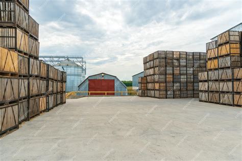 Premium Photo Rows Of Wooden Crates Crates And Pallets For Storing And Transporting Fruits And