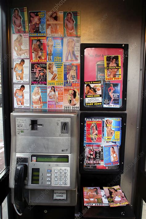 Sex Worker Cards In Public Phone Box Stock Image C Science Photo Library