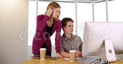 Female And Male Colleagues Problem Solving On Project In Corporate Office Stock Video Video Of