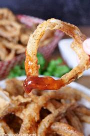 Crispy Onion Strings Deliciously Seasoned Crispy Onion Strings Deliciously Seasoned
