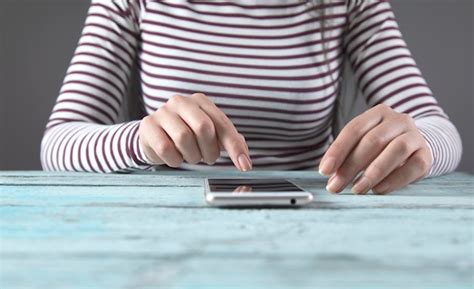 Premium Photo Woman Hand Holding Smart Phone