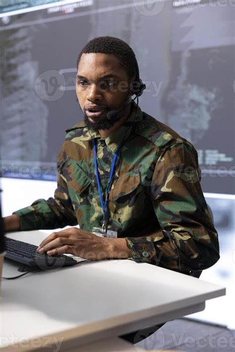 Government Intelligence Officer Handling Surveillance Operations From Cctv Satellite System