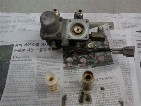 월곡자동차서비스 서울lpg차량엔진수리전문 싼타모lpg카스타엘피지주행중시동꺼짐시동불량rpm상승가속불량연비불량엔진부조 현상으로 수리내역 기화기수리믹서크리닝