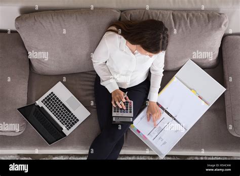 Accountant Woman Calculating Finance Invoice Using Calculator Stock Photo Alamy