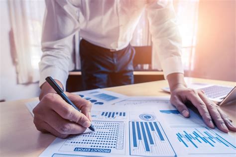 Premium Photo Businessman Analyze Data Of Stock Market Research