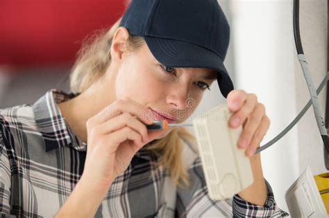 Female Electrician Installing Device Stock Photo Image Of Electrical Equipment 315449900