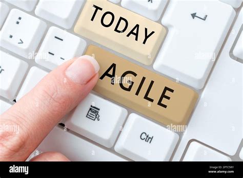hand writing sign agile business idea iterative approach to software