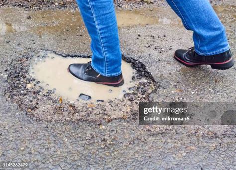 Step In Puddle Photos And Premium High Res Pictures Getty Images