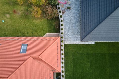 Premium Photo Closeup Of Attic Window On House Roof Top Covered With Ceramic Shingles Tiled