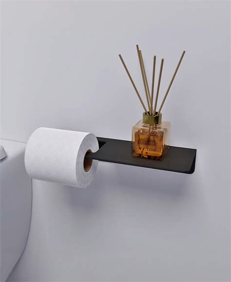 Тримачі для туалетного паперу