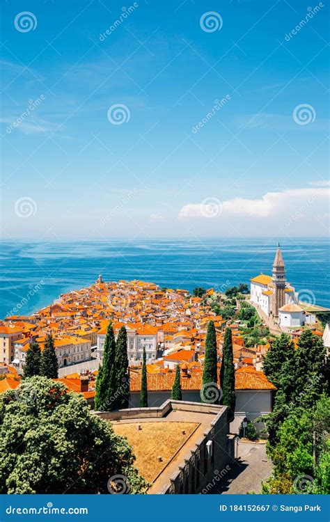 Panoramic View Of Piran Old Town And Adriatic Sea With St George`s