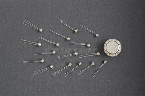 Old Many Soviet Transistors In Metal Case On Black Background