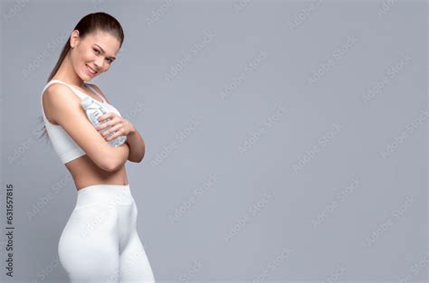 Happy Smiling Athletic Young Woman After Cardio Workout In The Gym