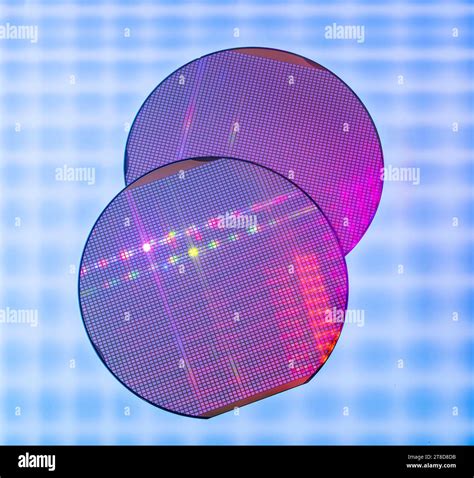 Macro Of Silicon Wafer Semiconductor With Neon Color Integrated Circuits To Manufacture Cpu And