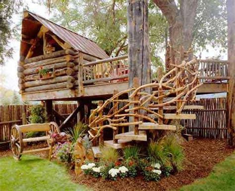 A Tree House Built Into The Side Of A Yard