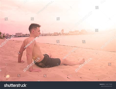 Naked Sports Guy Sitting On Beach 스톡 사진 1144117229 Shutterstock