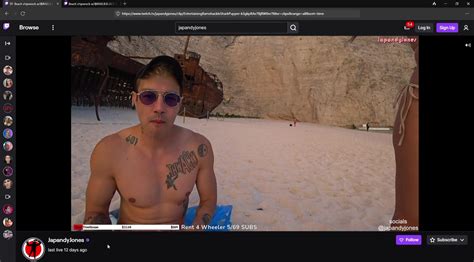 Tattooed Muscled Streamer At The Beach