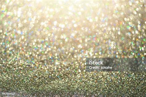 빛 Bokeh와 화려한 반짝이 배경입니다 빛나는 축제 인사말 카드입니다 새 해와 크리스마스 개념입니다 스파클링 텍스처 2020