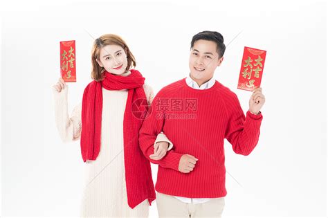 新年情侣发红包高清图片下载 正版图片501124123 摄图网