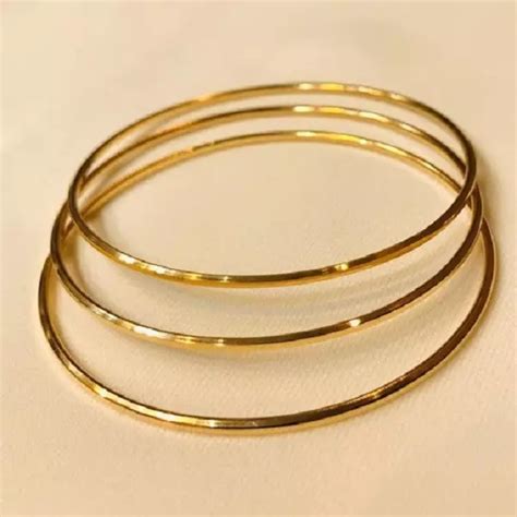 خرید و قیمت النگو طلا 18 عیار زنانه مدل بدون نگین ساده بسته 2 عددیسیب