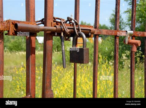 Locked Rusty Gate Stock Photo Alamy