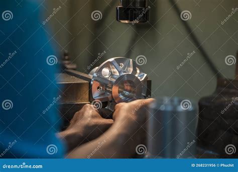the operator setup the cnc machine milling machine by press the