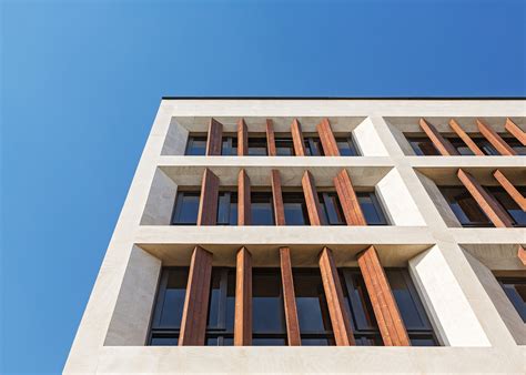 Tehran Office Building By Awe Office Features Faceted Windows And Louvres