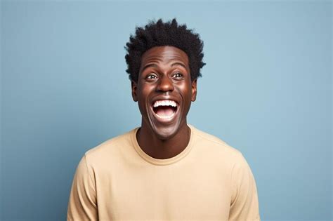 Premium Photo Alluring Unshaven Young Man With Dark Skin Laughing Out