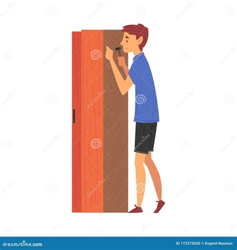 Man Assembling And Installing New Furniture Male Worker Hammering Nail Into Wardrobe Manual