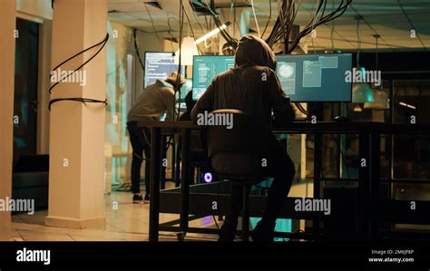 Woman Hacker Planning Phishing And Espionage At Night Trying To Break