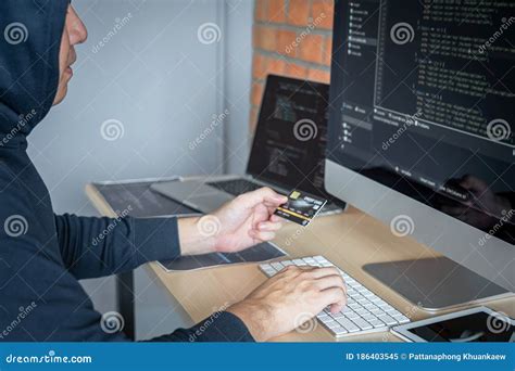 Computer Hacker Or Cyber Attack Concept Dangerous Hooded Hacker Using