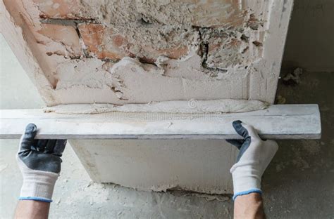 Man Is Putting Gypsum Baseboard With Glue On Ceiling Maintenance