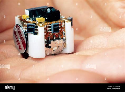Robotics Research Robot Held In A Researchers Hand This Small Robot Called Mini Alice Has