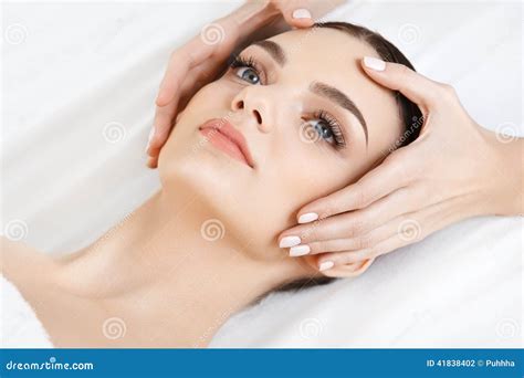 Face Massage Close Up Of A Young Woman Getting Spa Treatment Stock